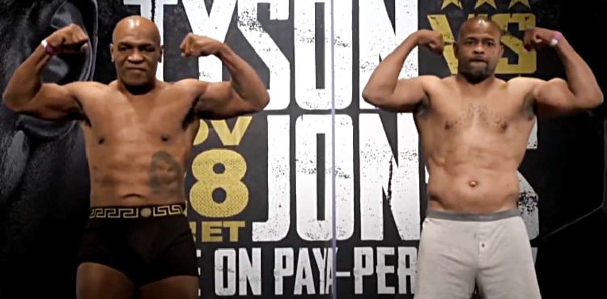 Mike Tyson and Roy Jones Jr. weigh in then face-off with plexiglass ...