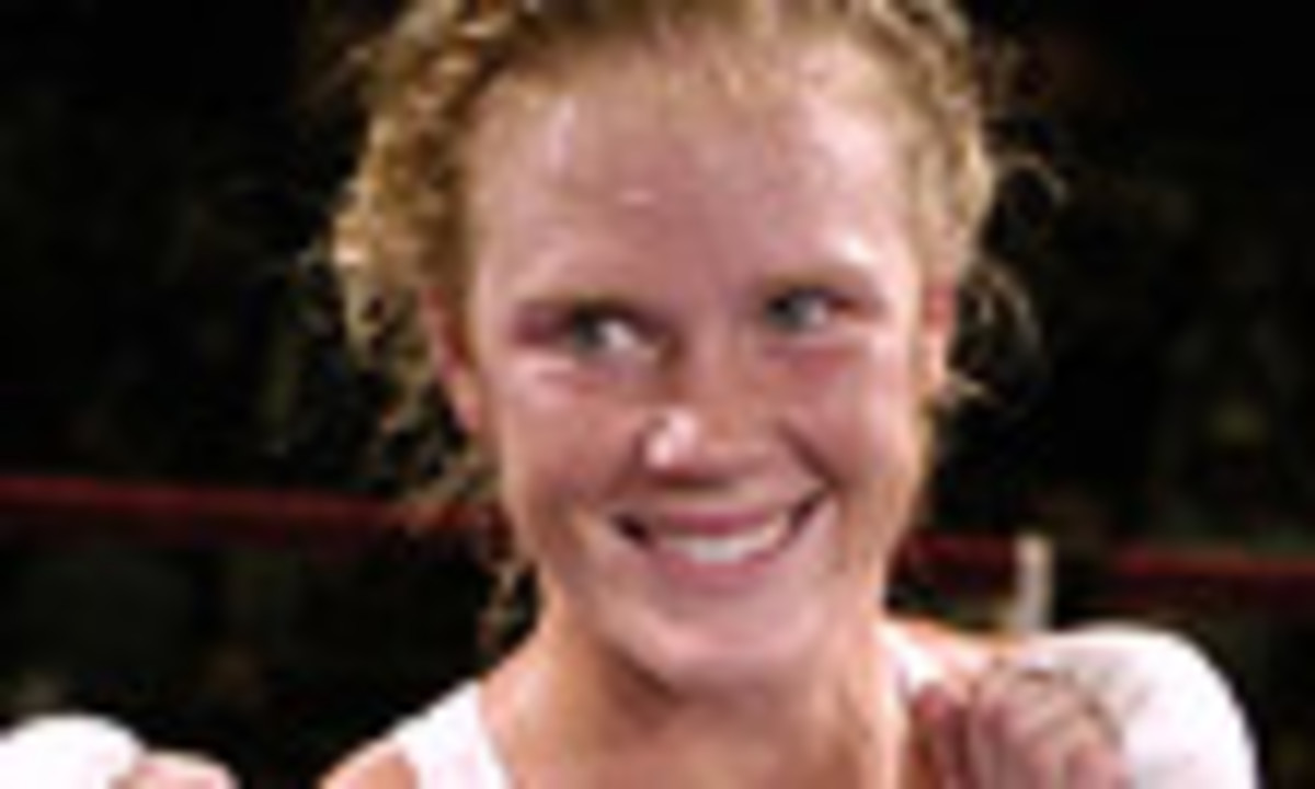World Champion Boxer Holly Holm Giving Up Pugilistic Pursuits for MMA ...