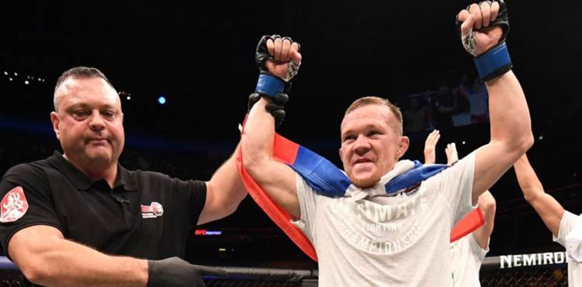 Peter Yan keeps winning streak alive against John Dodson (UFC Prague ...