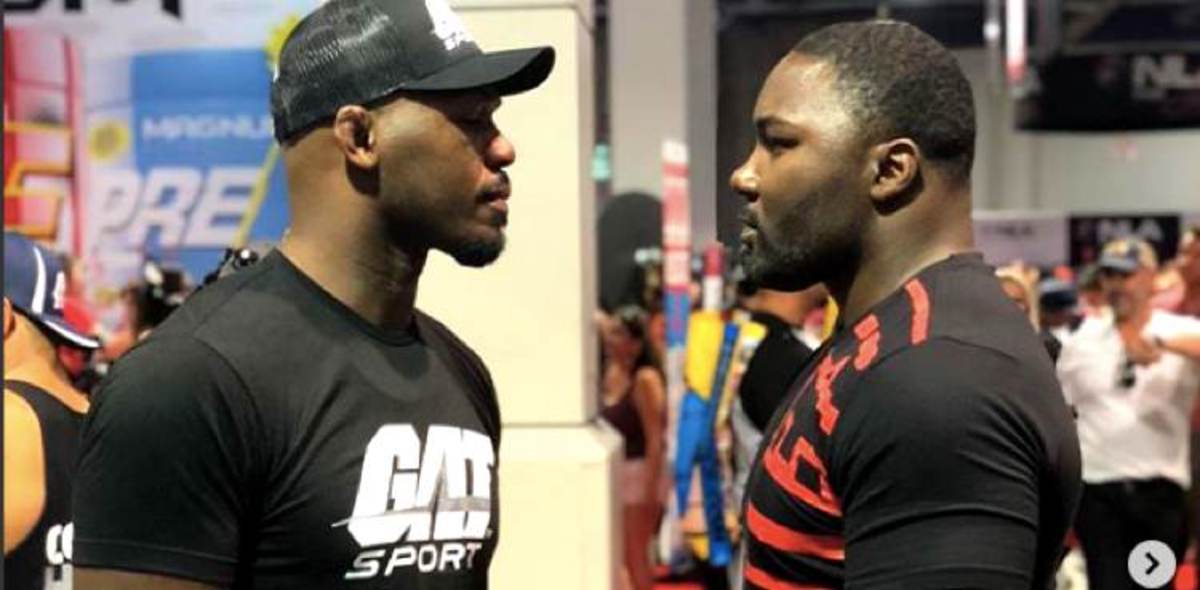 Jon Jones and Anthony Johnson Meet for a Staredown... Three Years Later ...